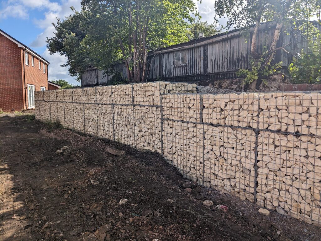 The Design and Installation of a Gabion Retaining Wall to Protect a ...